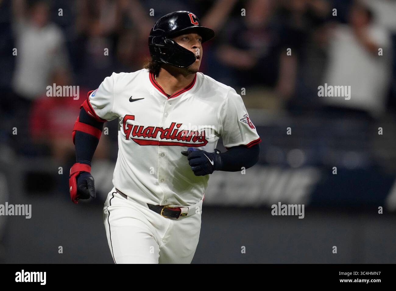 Cleveland Guardians' Bo Naylor watches his home run in the seventh ...