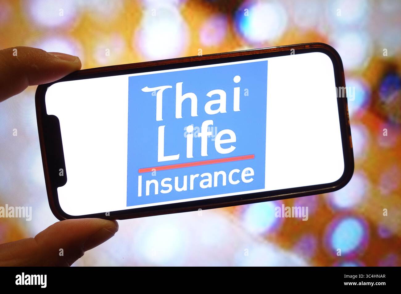 In this photo illustration, a Thai Life Insurance company logo is seen ...
