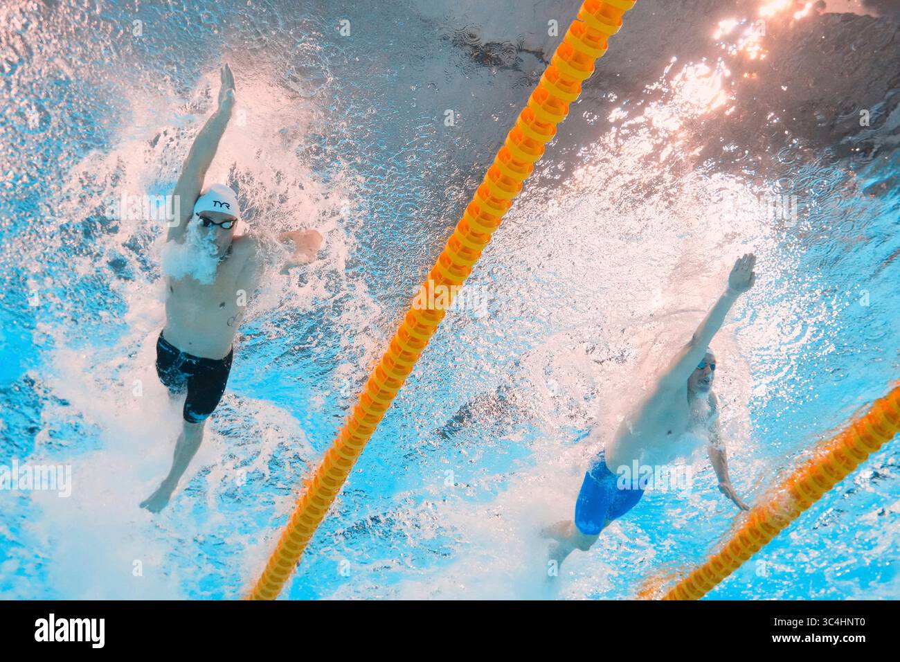 Bobby Finke of the United States, left, and Sven Schwarz of Germany ...