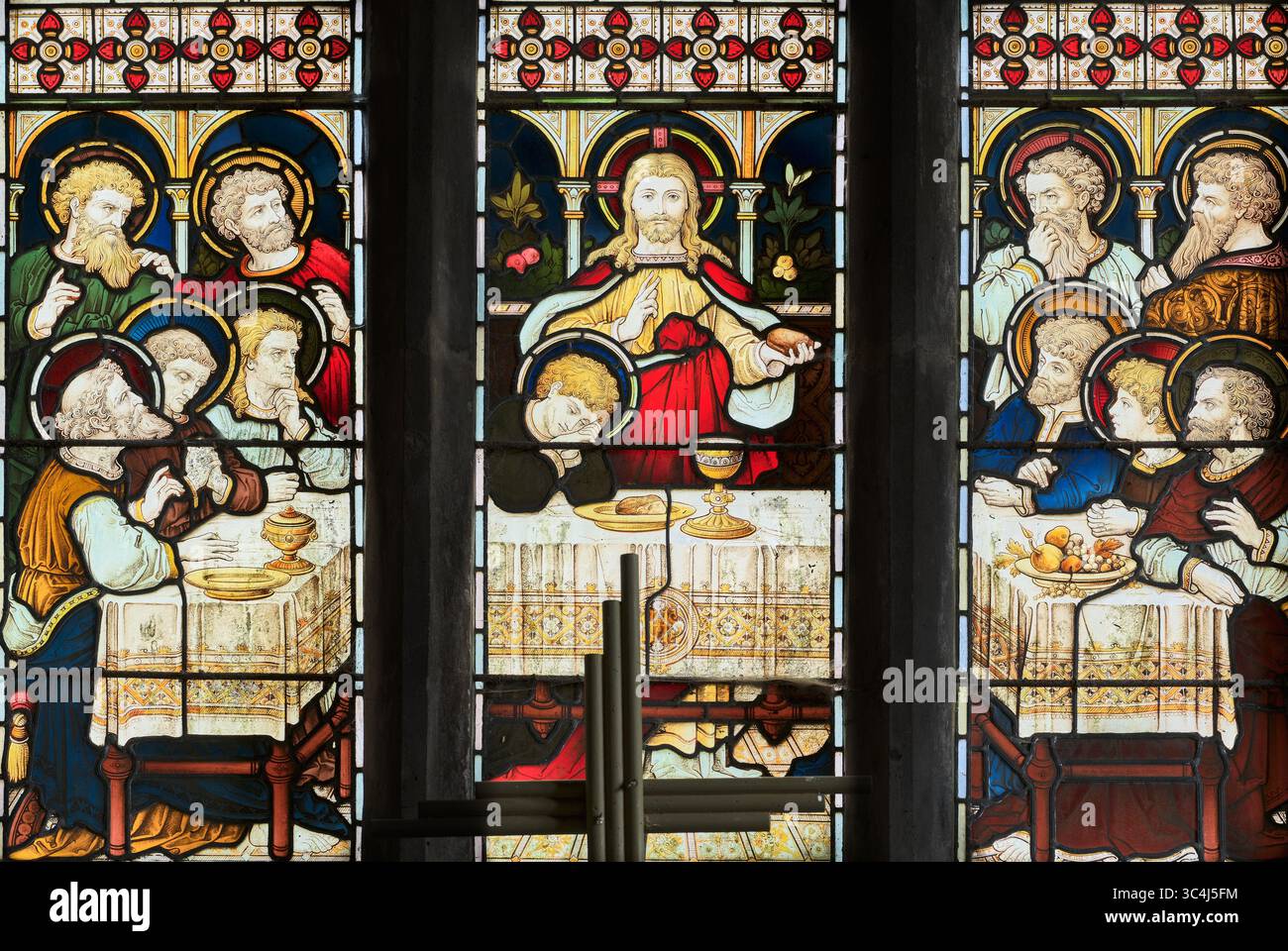 Stained glass window, of Jesus' last supper, in the christian parish ...