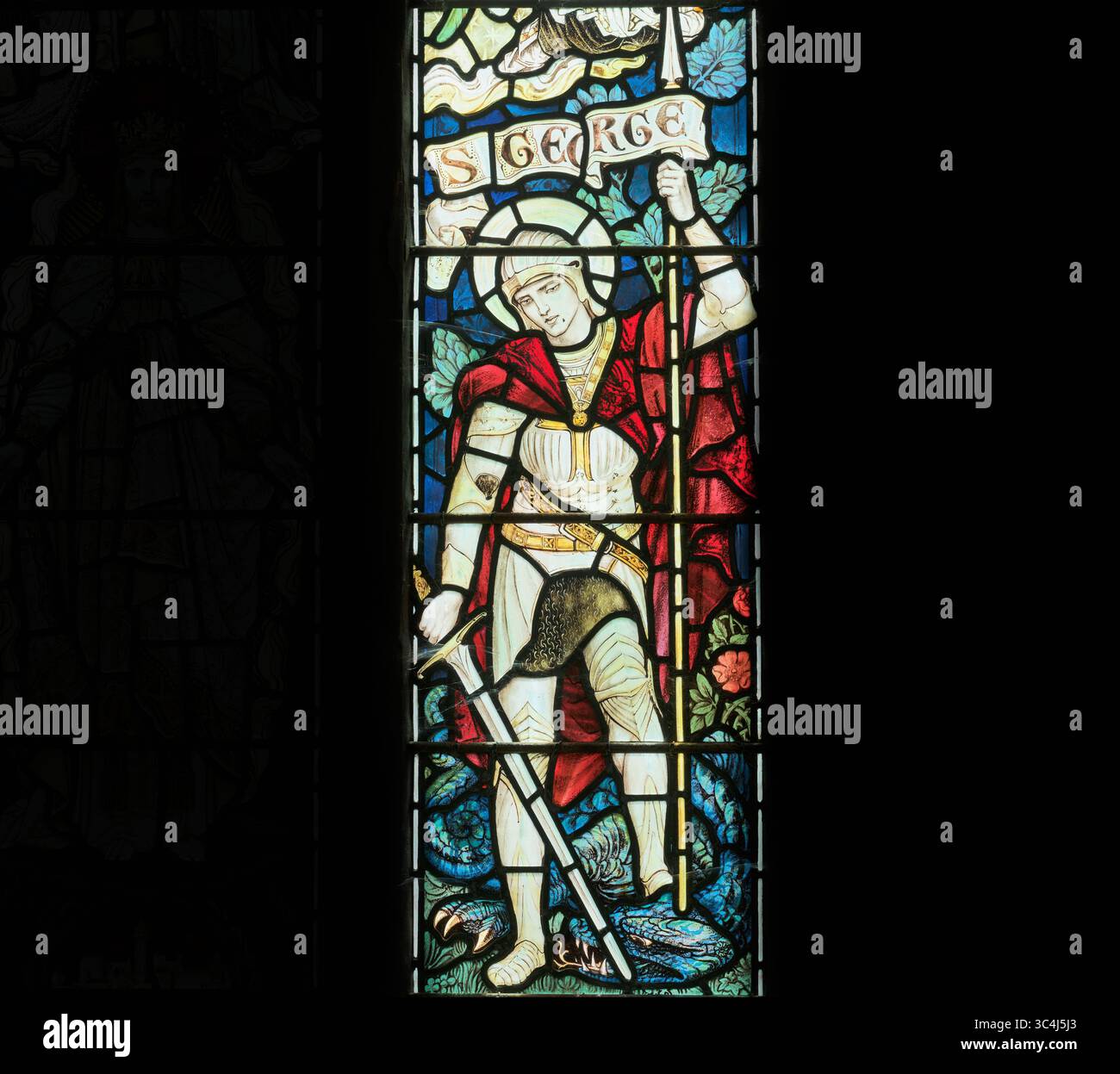 Stained glass window, of St George, in the christian parish church of ...