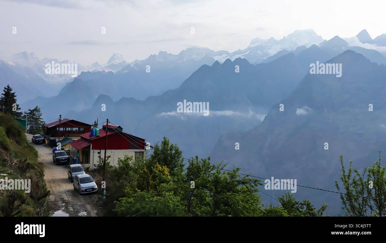 Panoramic view of the Nanda Devi Mountain Range, observed from Auli in Joshimath, Uttarakhand ...