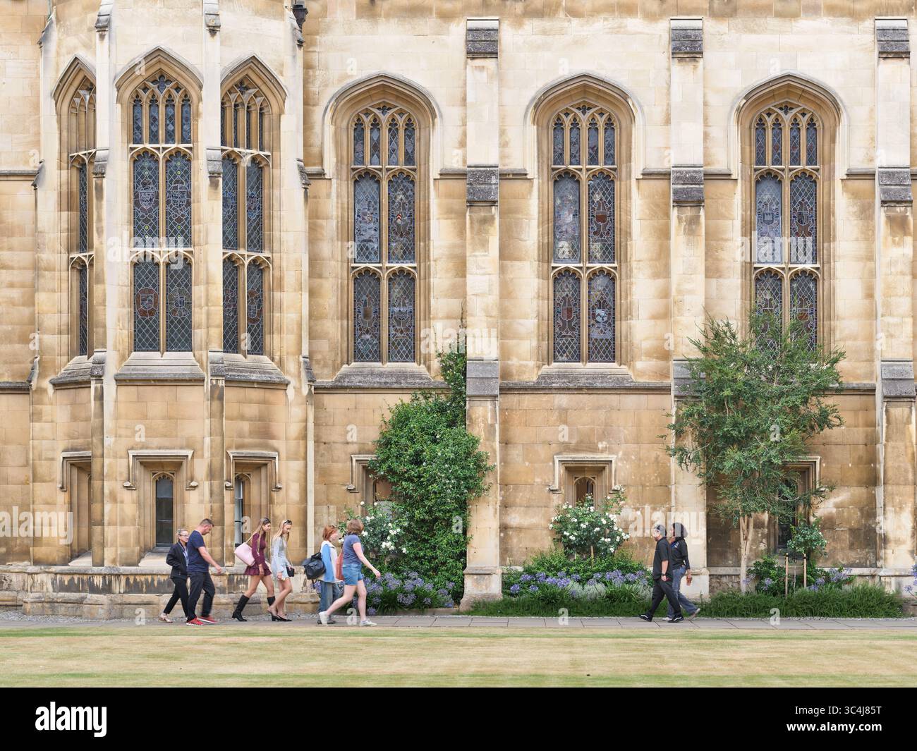 Students walk past the Dining Hall, New Court, Corpus Christi College ...