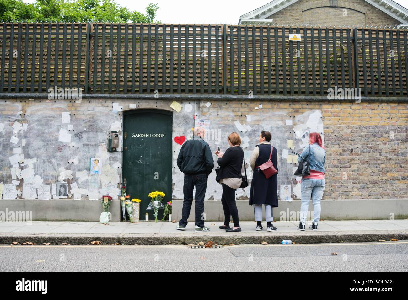 Flowers & graffiti outside Garden Lodge - the former home of Freddie ...