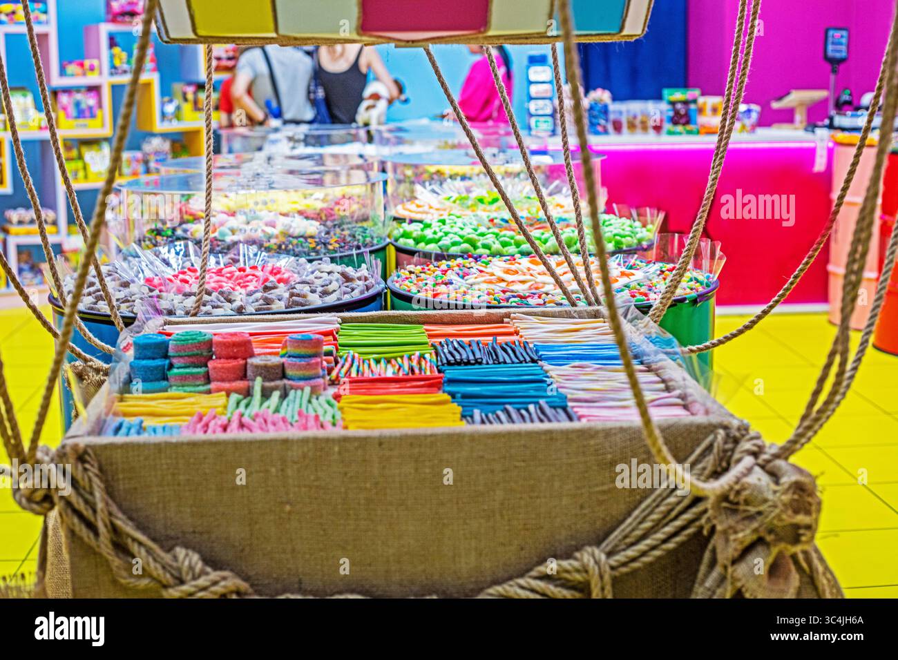various flavors and shapes of jelly candies and chewy sweets in a ...