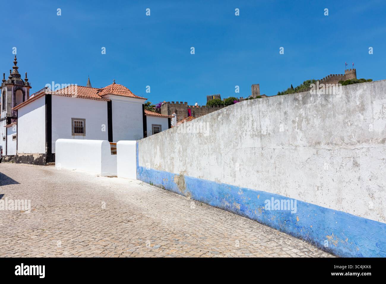 Historic Castle and Whitewashed Houses in Obidos Stock Photo - Alamy