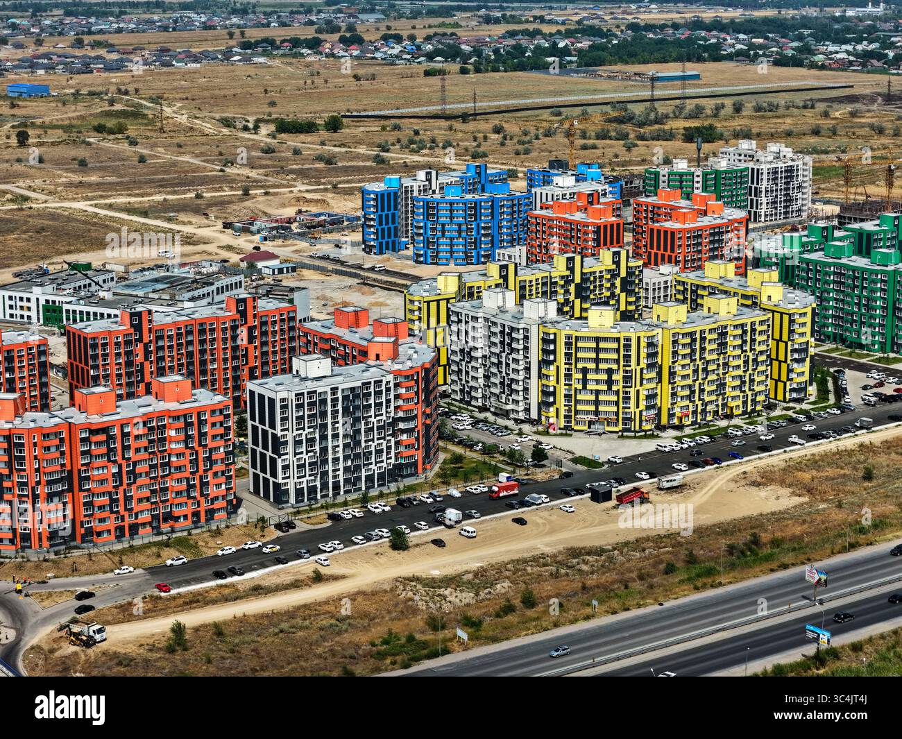 Multi-storey new houses. The central highway connecting the satellite ...