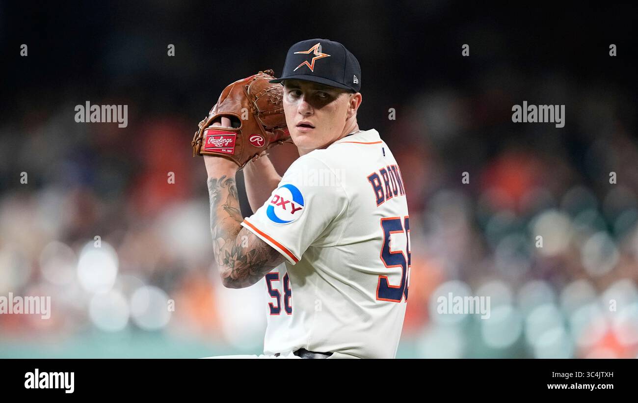 Houston Astros starting pitcher Hunter Brown throws against the ...