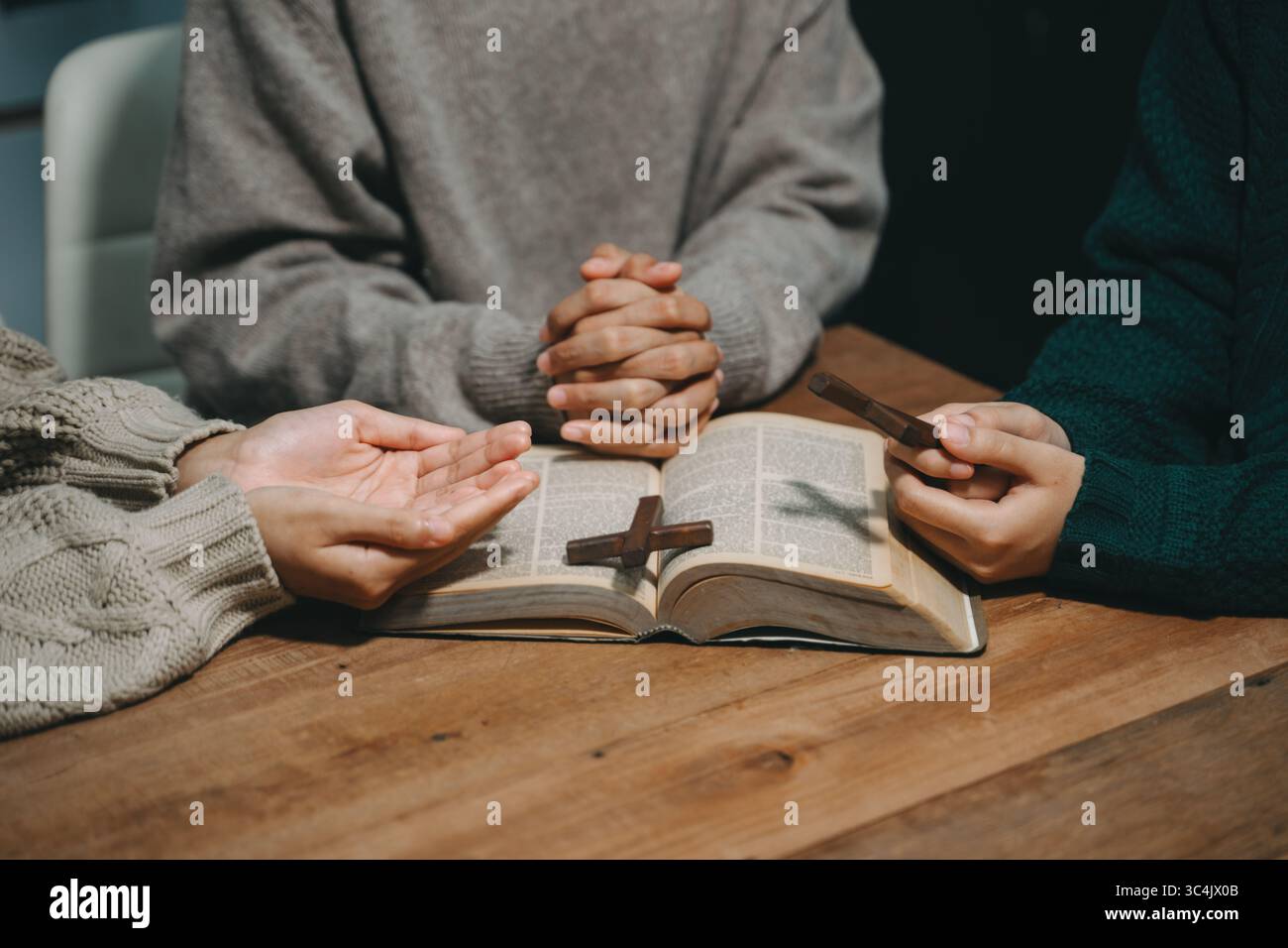 Christians are congregants join hands to pray and seek the blessings of ...