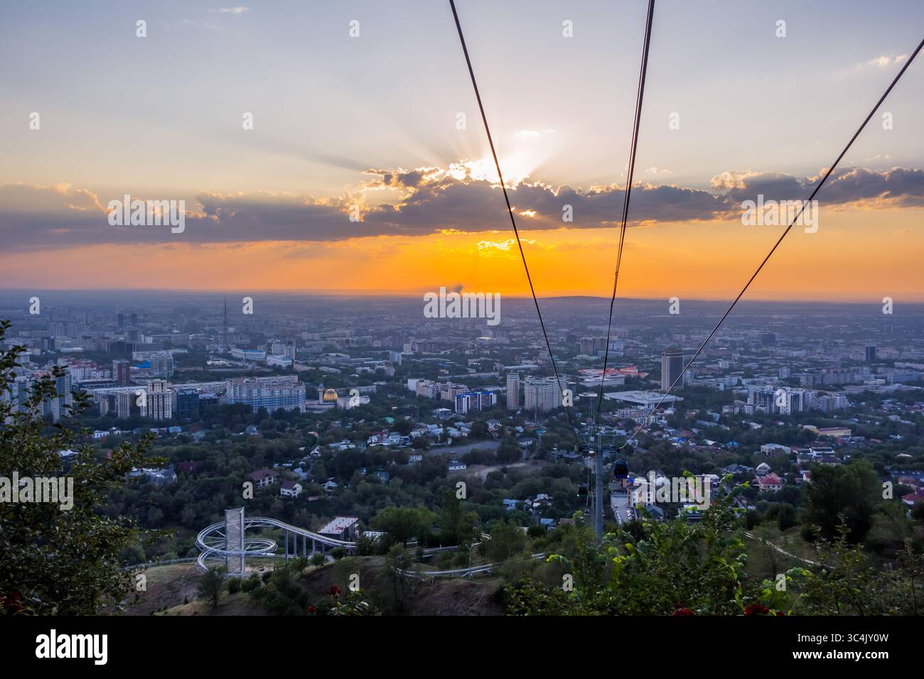 Aerial panoramic sunset view of Almaty, Kazakhstan from Kok Tobe ...