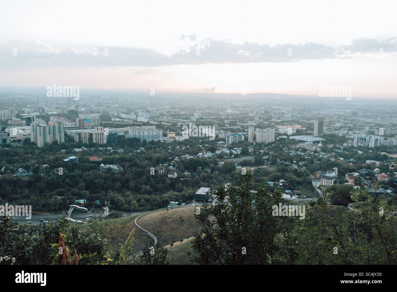 Aerial panoramic sunset view of Almaty, Kazakhstan from Kok Tobe ...