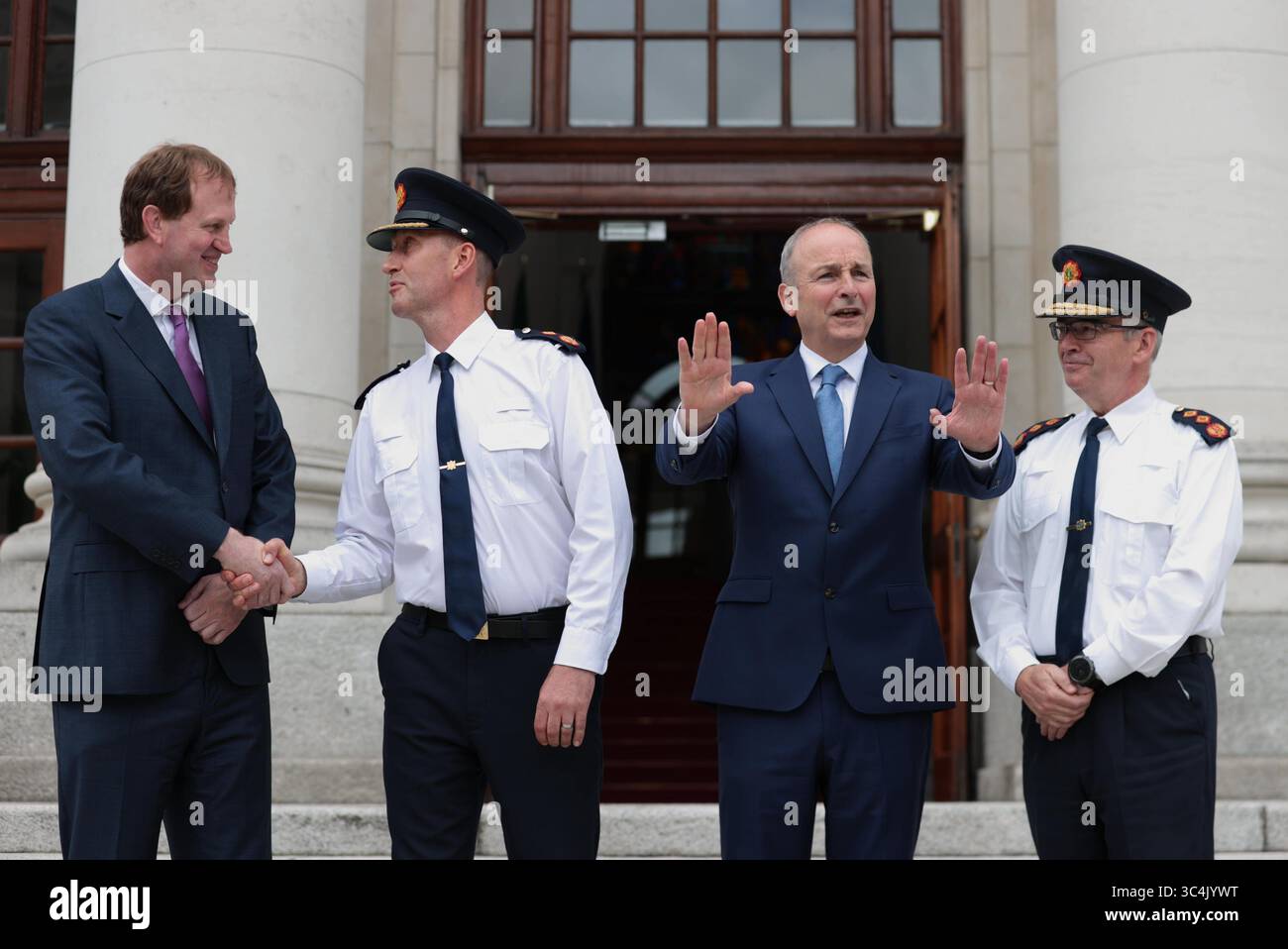 (left to right) Minister for Justice Jim O'Callaghan, Garda Deputy ...