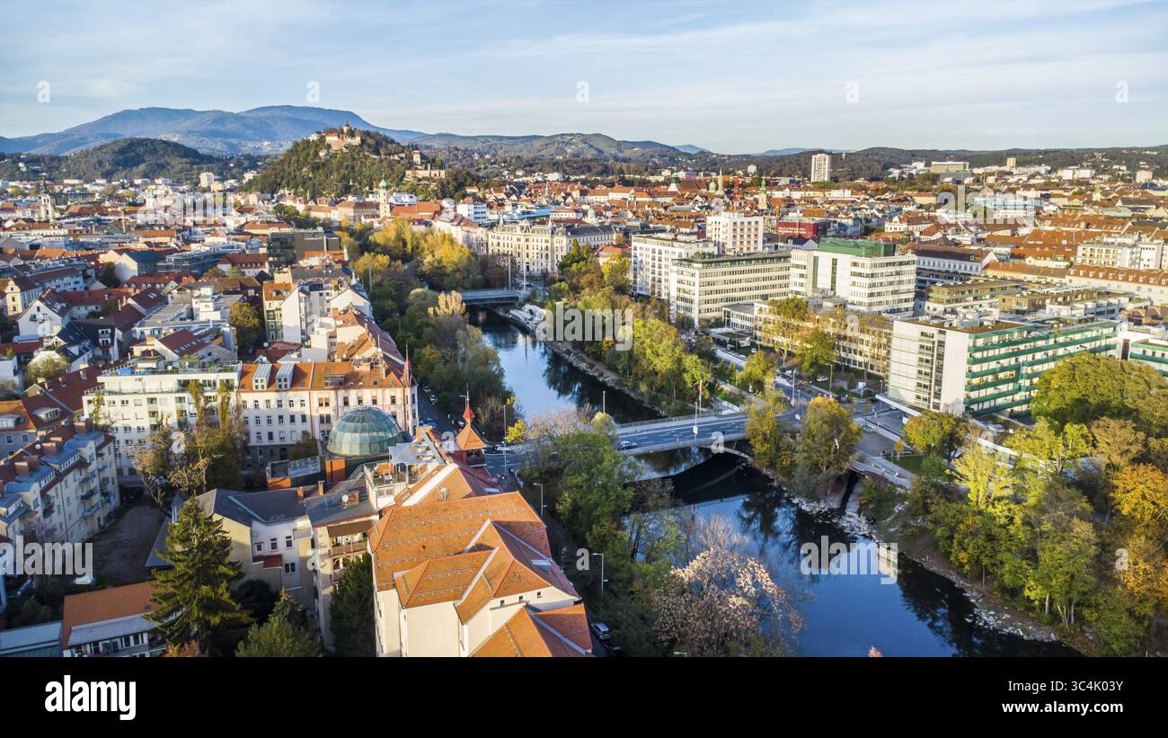 Aerial city view of Graz and the Mur River winding through the city ...