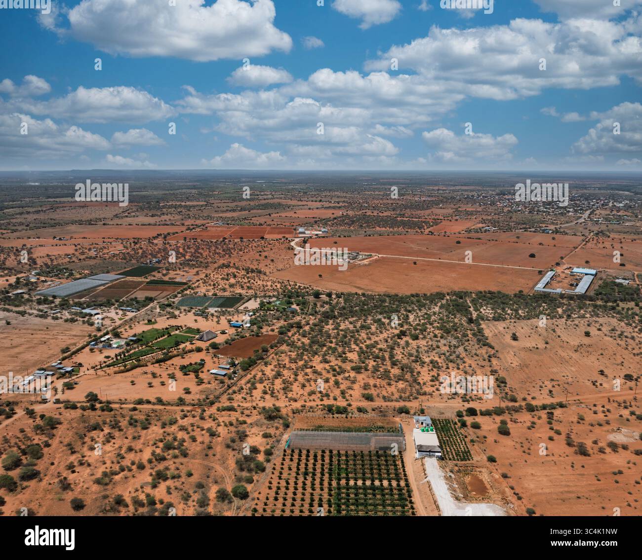 aerial view African landscape bush and farms village in the background ...