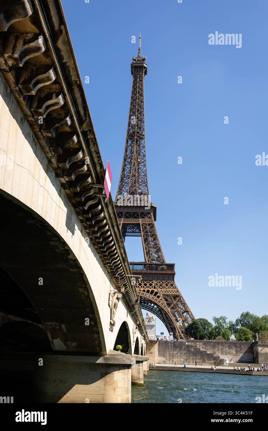 Dramatic angular view of Eiffel Tower from Pont d'Iéna bridge Paris ...
