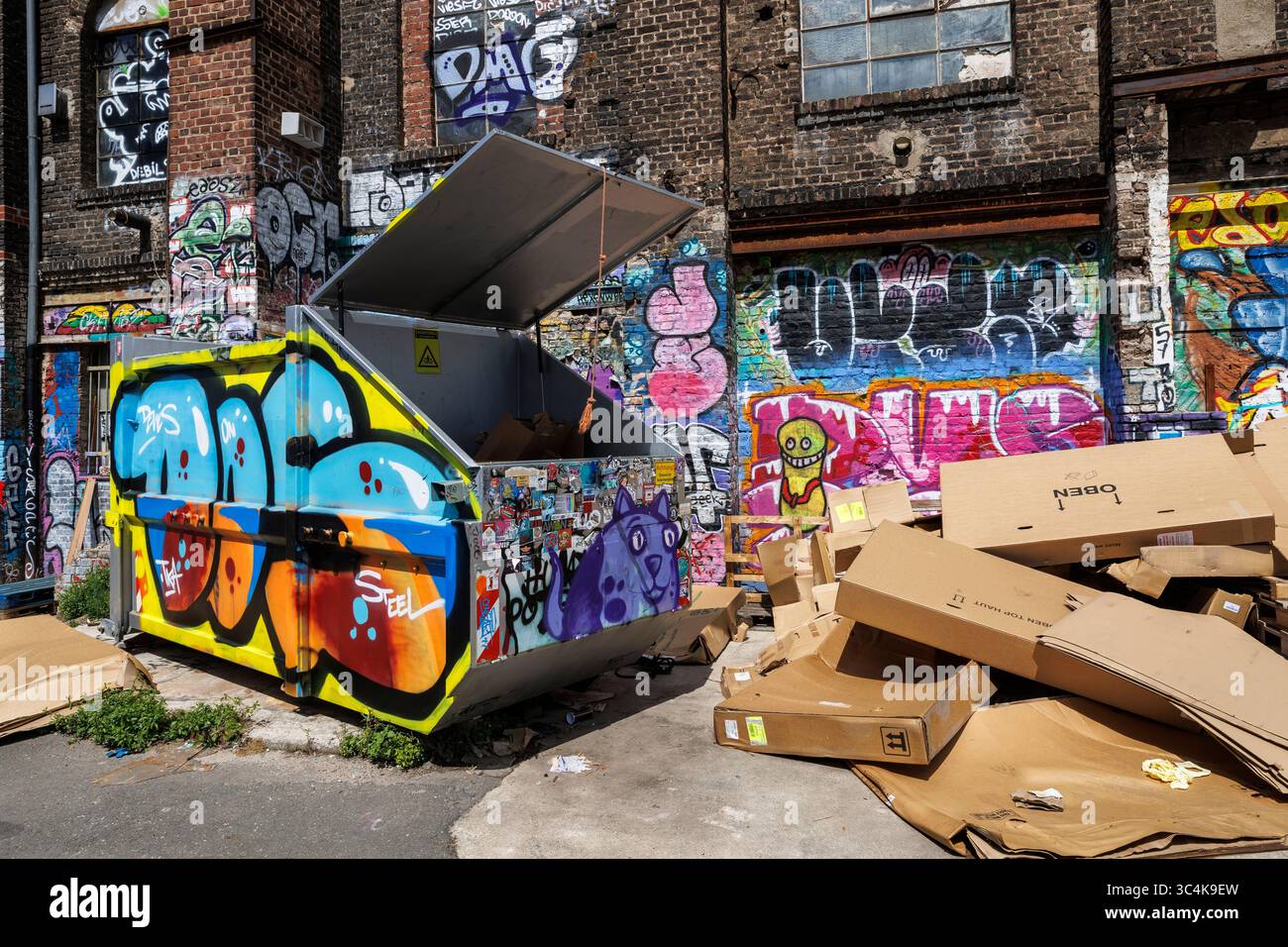graffiti on the Rheinlandhalle and a waste container, former factory ...