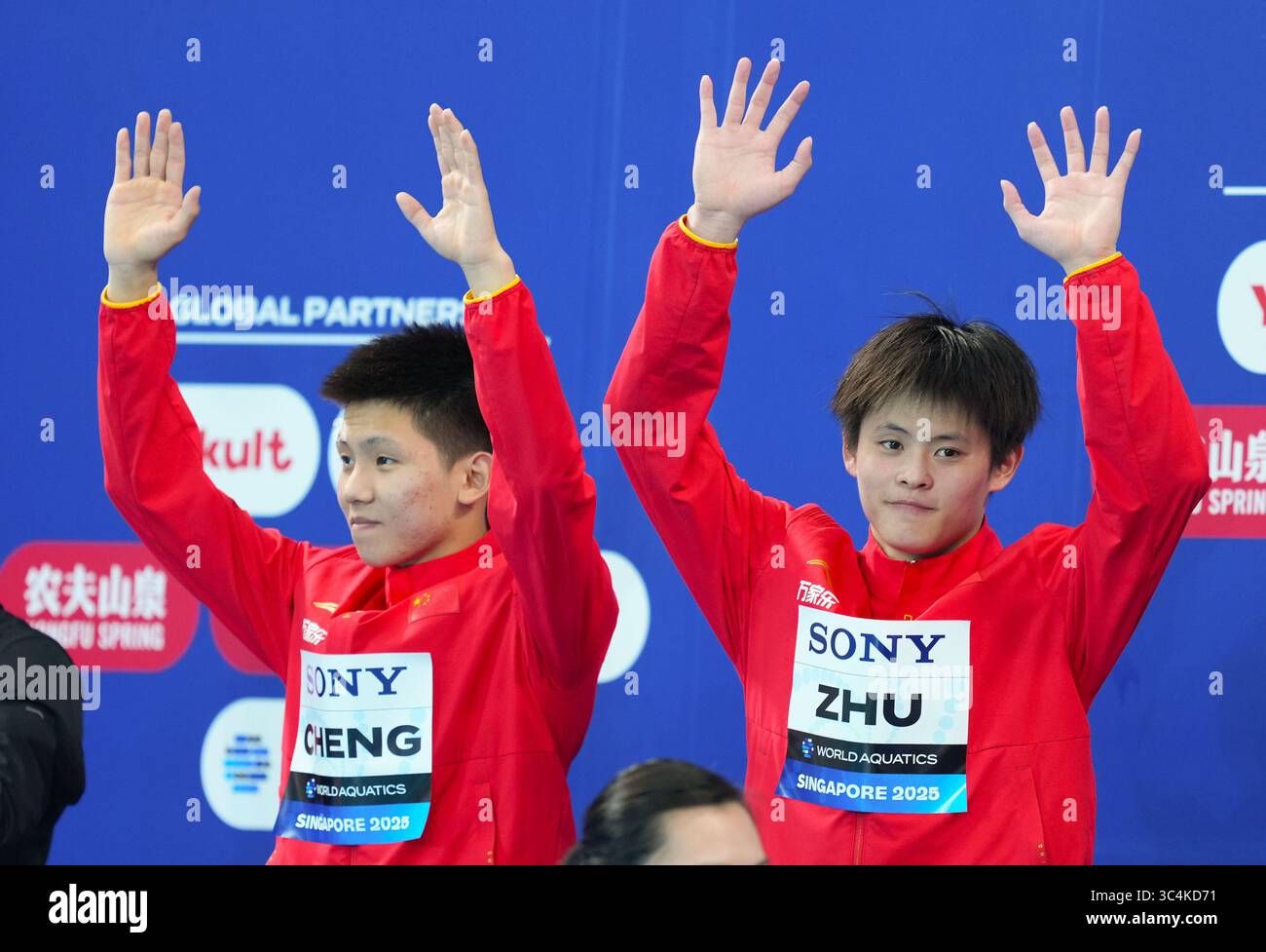 Singapore. 29th July, 2025. Cheng Zilong (L)/Zhu Zifeng of China attend ...