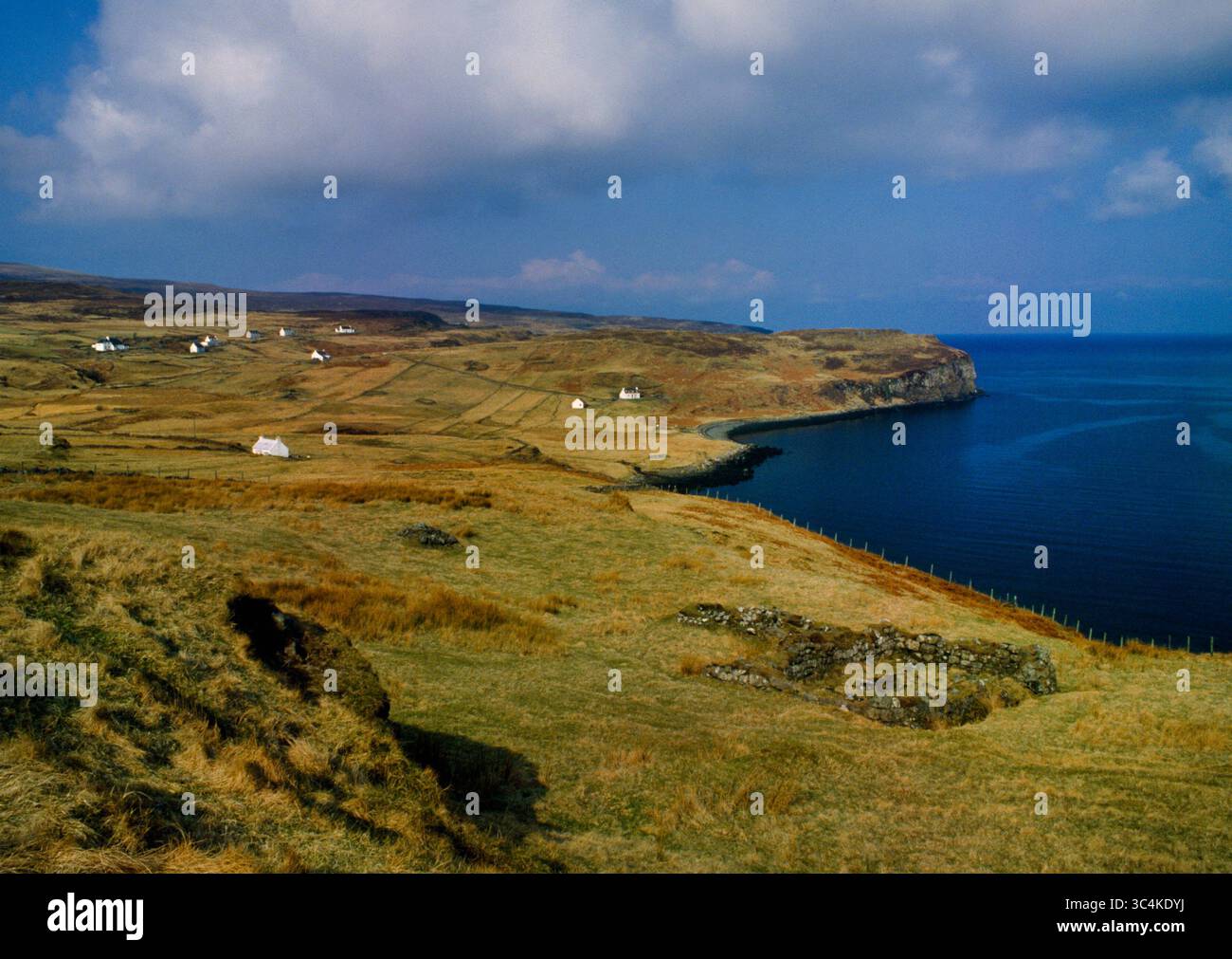 View NW from Dun Boreraig Broch of a ruined croft house & the modern ...