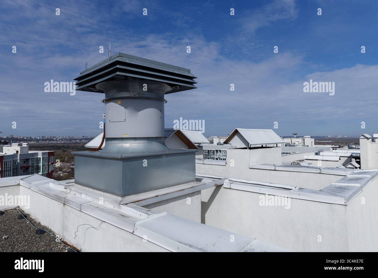 Top View of a Modern Rooftop Ventilation System Surrounded by Urban ...