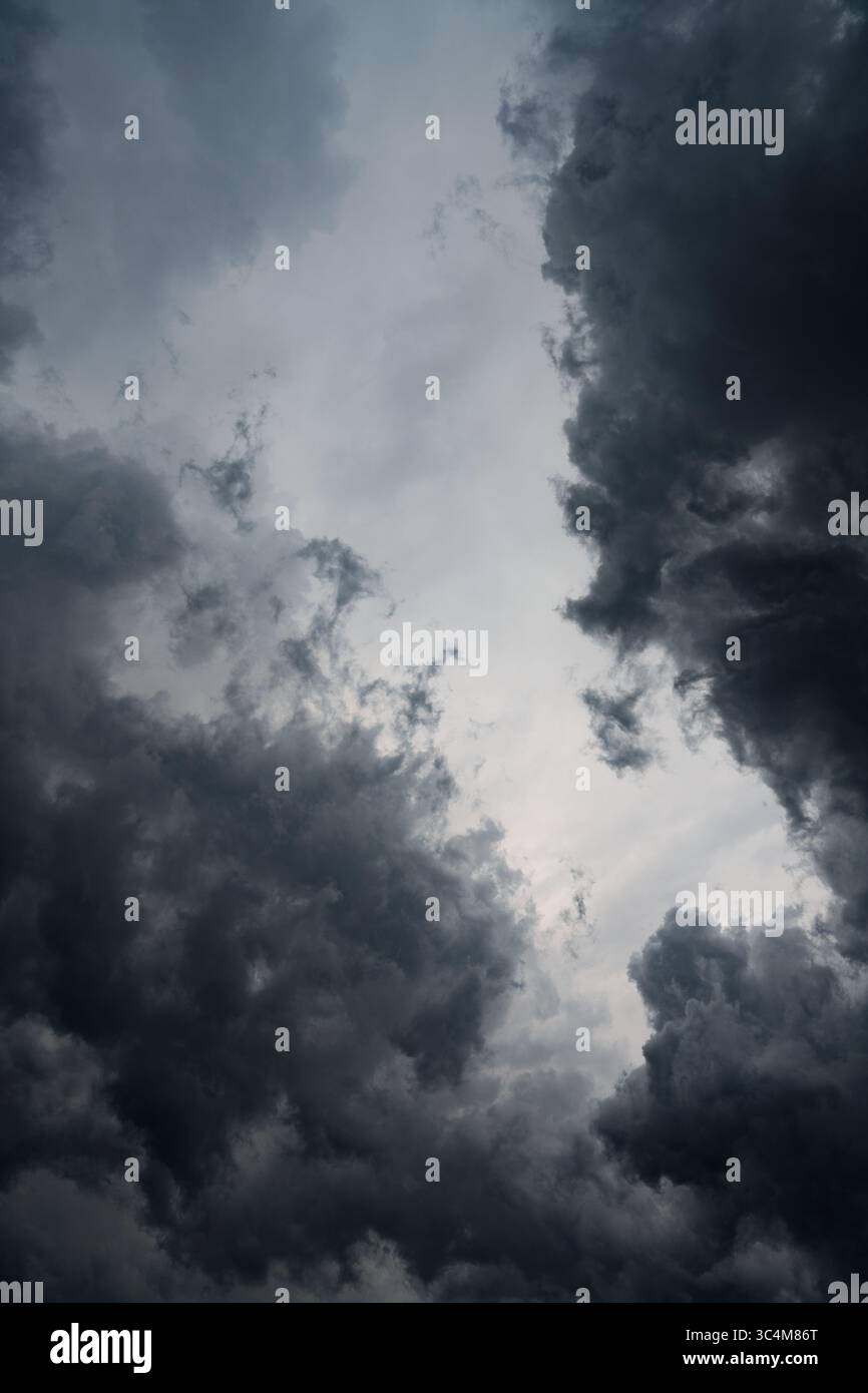 Vertical photo of dark gray storm clouds before rain. Storm, darkness ...