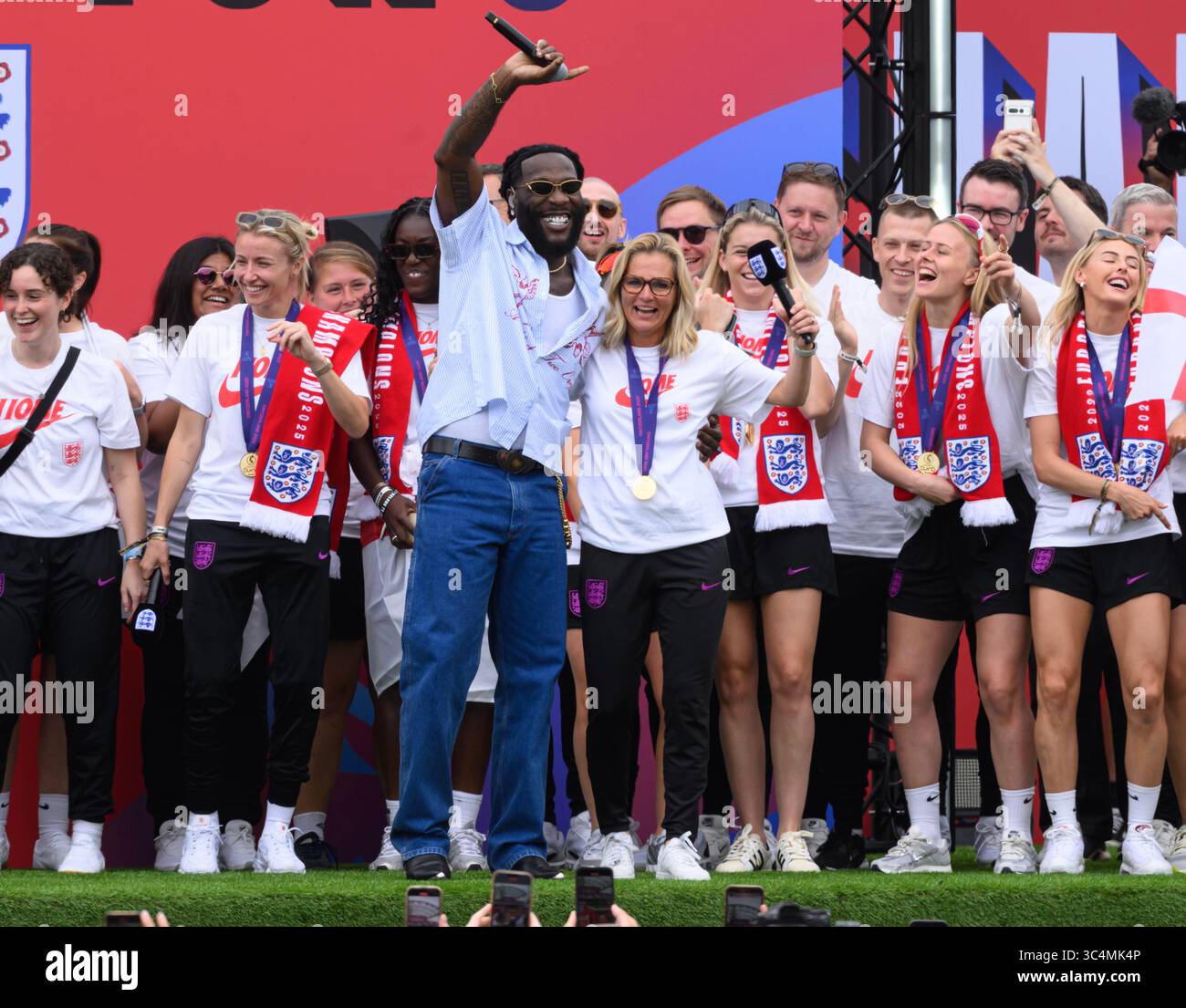 London, UK. July 29th, 2025. Burna Boy with Hannah Hampton, Leah ...