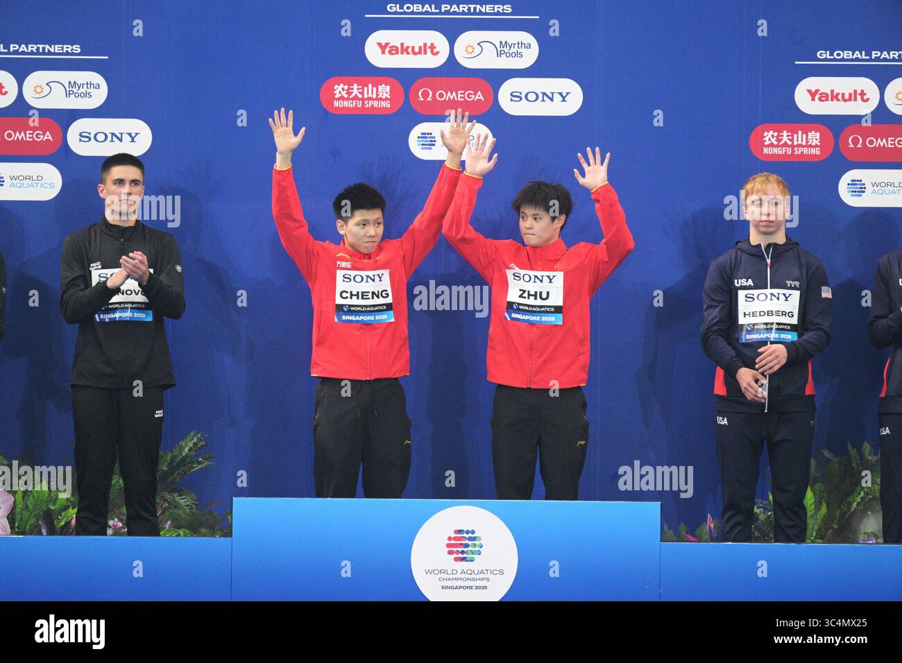 Singapore. 29th July, 2025. Gold medalists Cheng Zilong (2nd L)/Zhu ...
