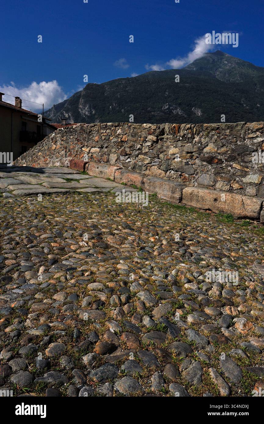 Cobblestones and rutted flagstones pave roadway of Ponte Romano single ...