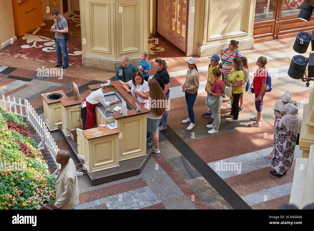 Moscow, Russia - July 17, 2025: People queue for ice cream inside the ...