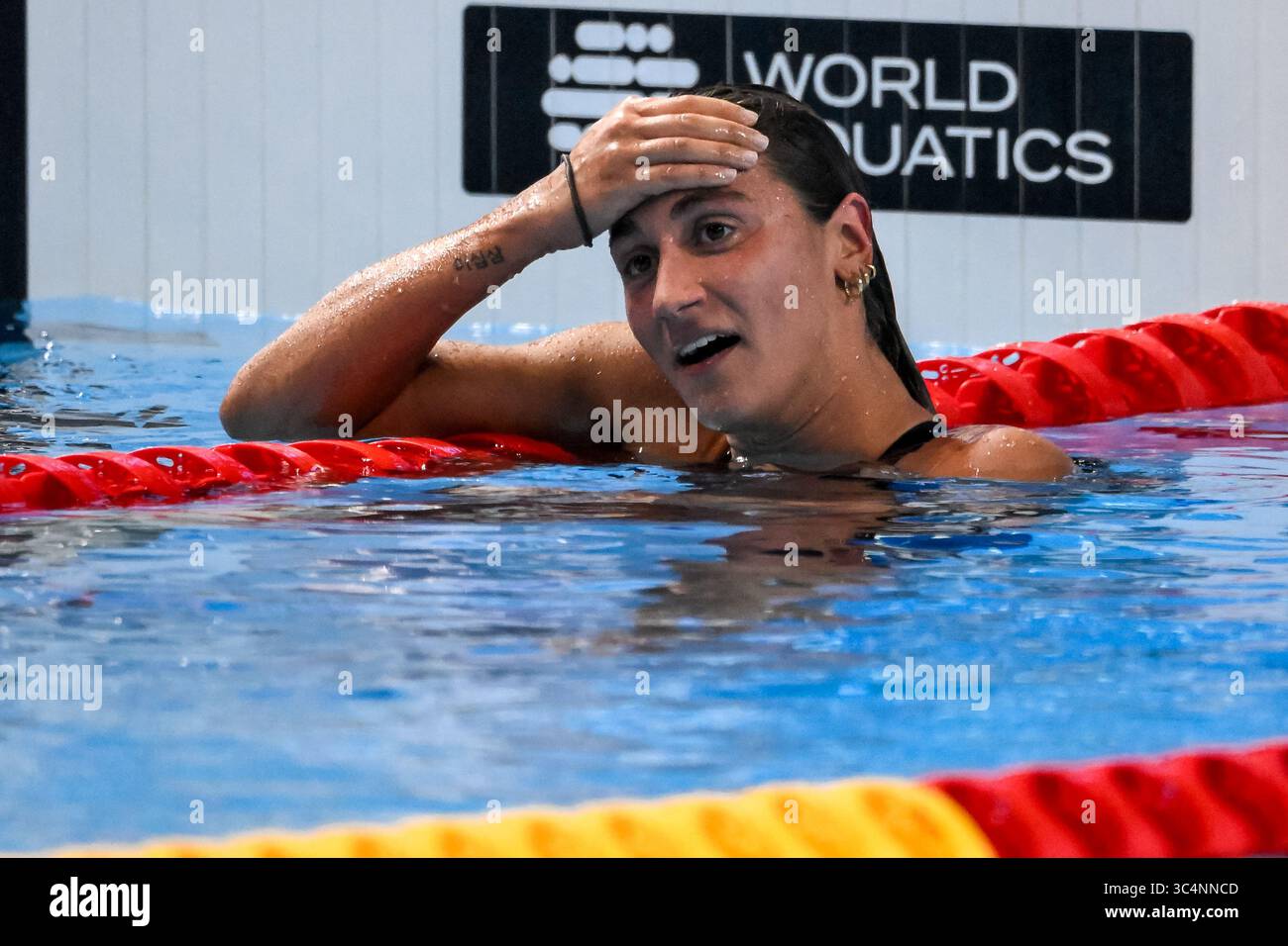 Simona Quadarella of Italy reacts after winning the silver medal in the ...