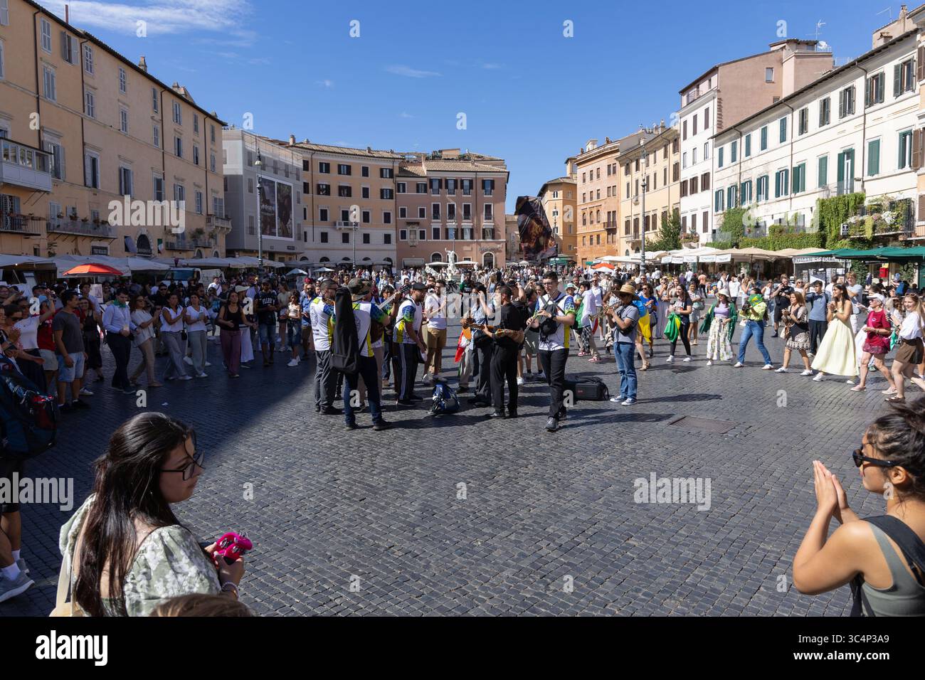 Groups of young pilgrims from around the world sing and dance in Piazza ...