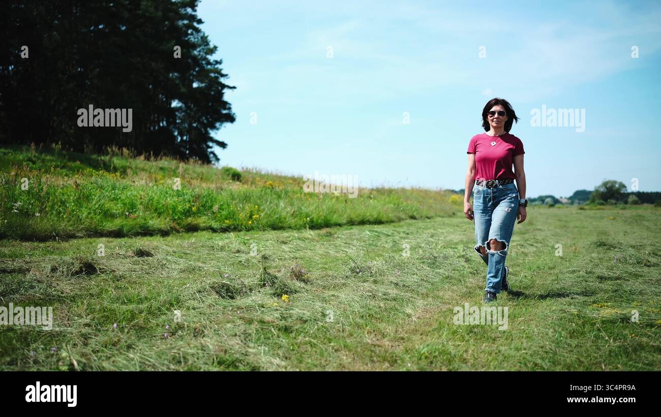 Graceful lady walking in rural hi-res stock photography and images - Alamy