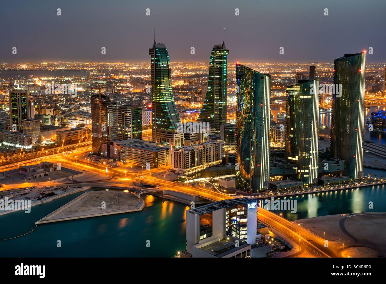 Aerial view of the illuminated Bahrain World Trade Center and Bahrain ...