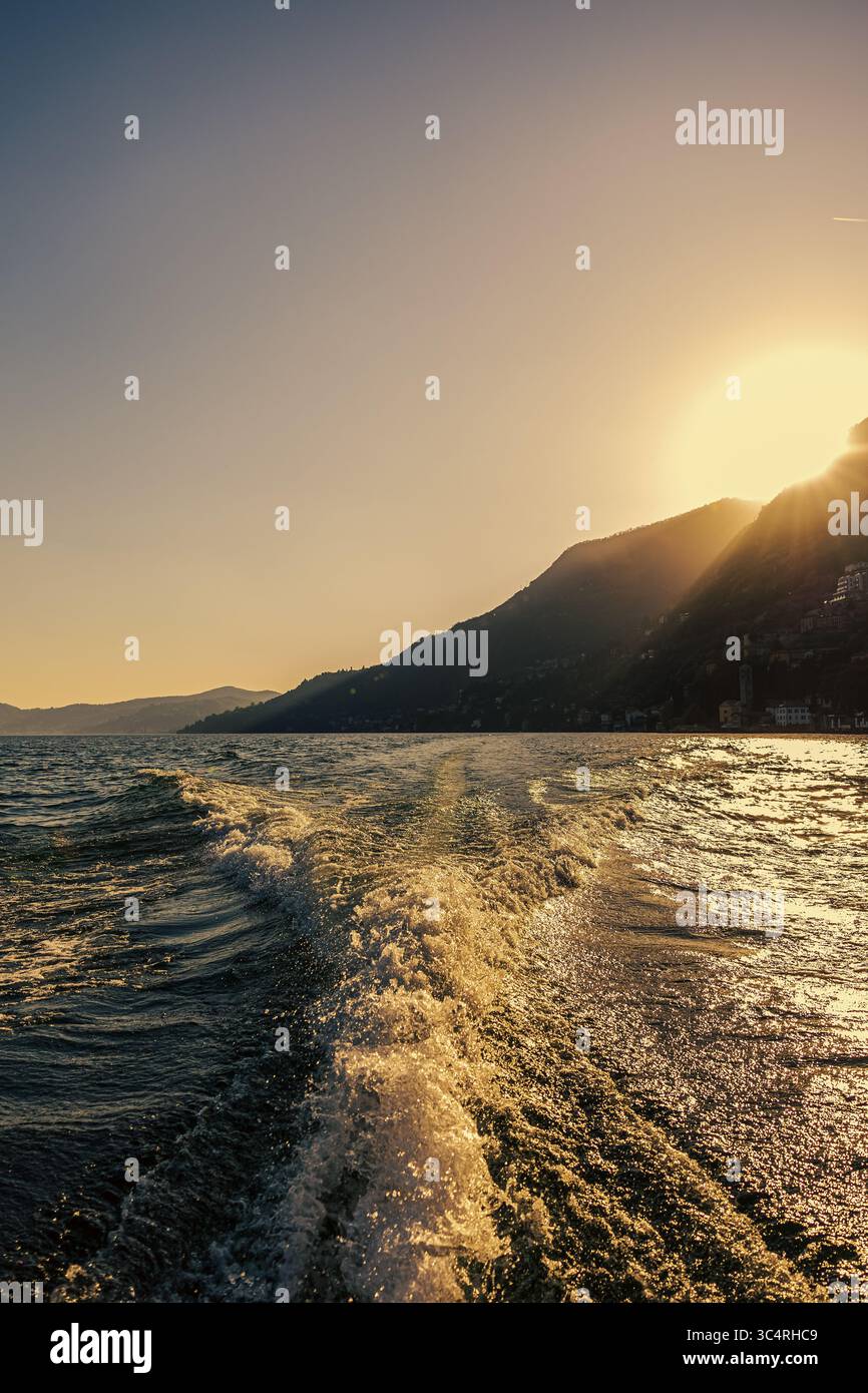 Sunset over Lake Como, view from a boat Stock Photo - Alamy