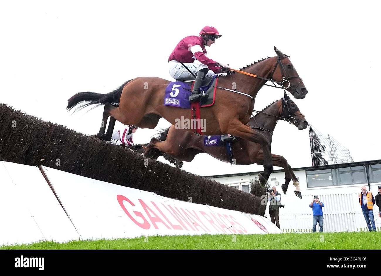 King Of Kingsfield ridden by Jack Kennedy (centre) on their way to winning the Latin Quarter ...