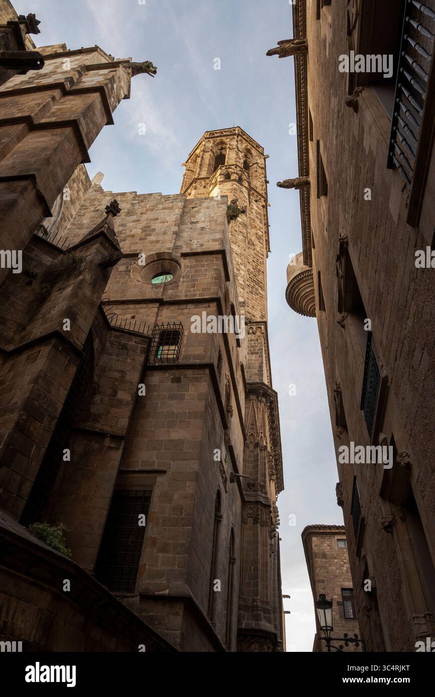 Narrow street in the Gothic Quarter of Barcelona. On the left is the ...