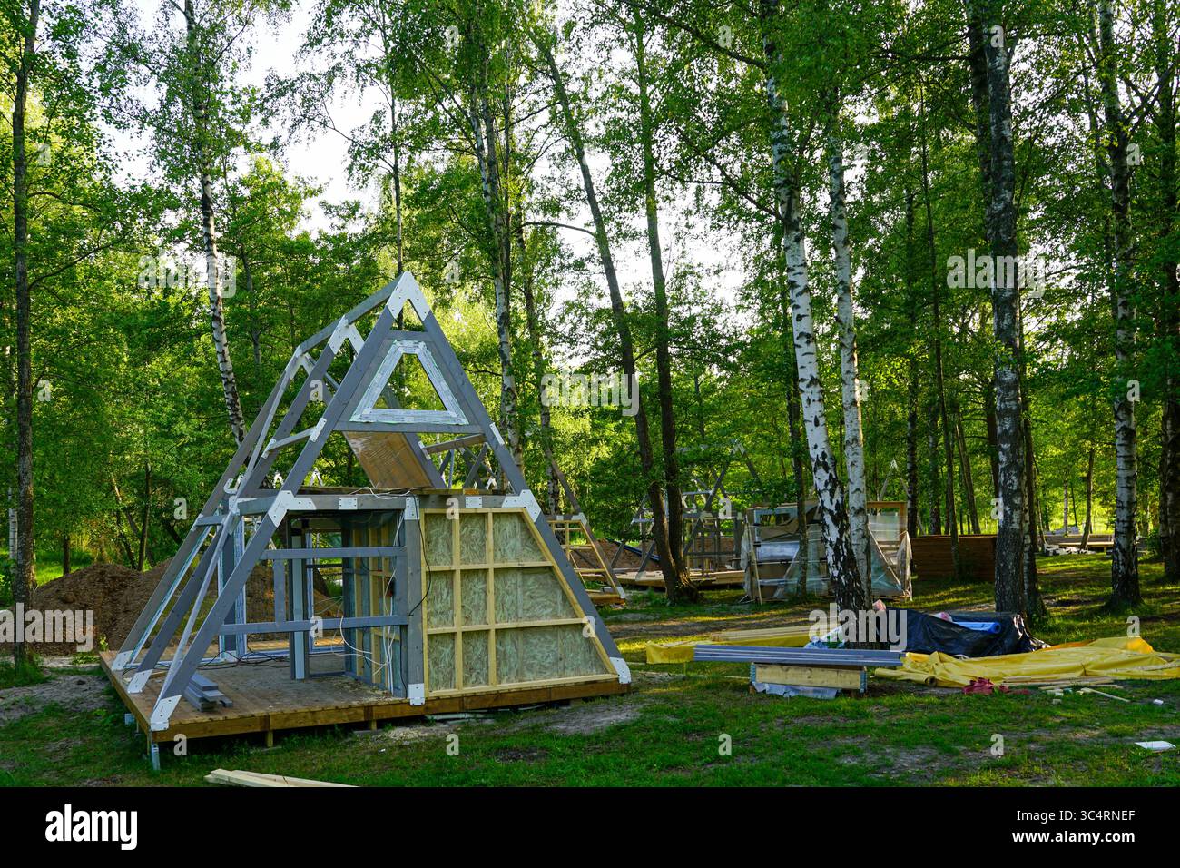 Sustainable cabin being built in hi-res stock photography and images ...
