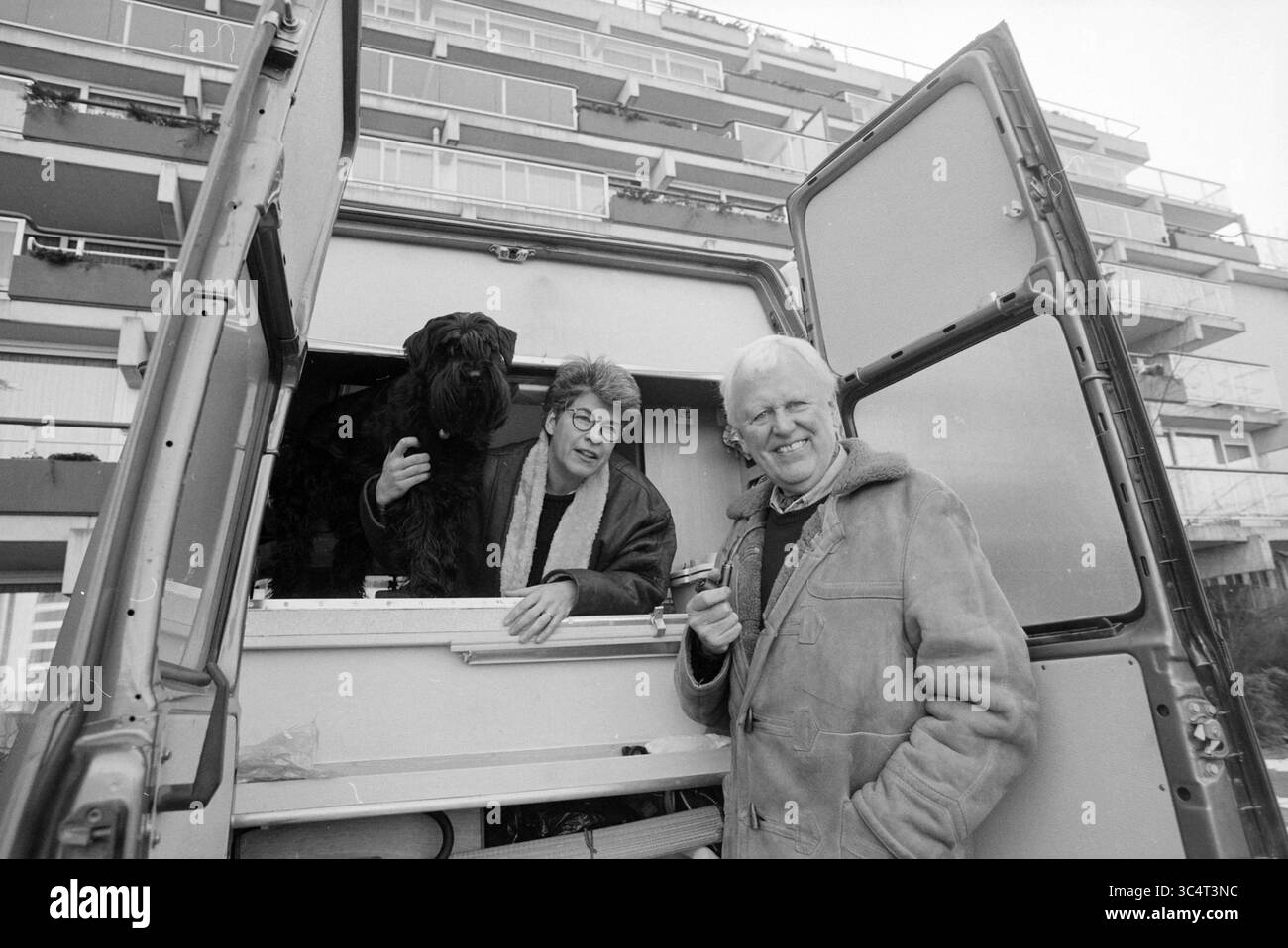 Two people stand Black and White Stock Photos & Images - Alamy