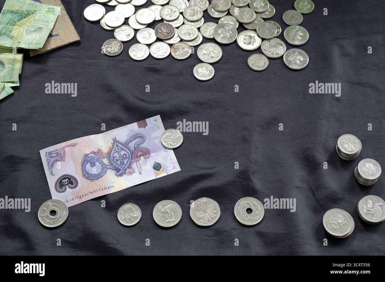 PAPUA NEW GUINEA, Port Moresby, local currency Kina coins and banknotes ...