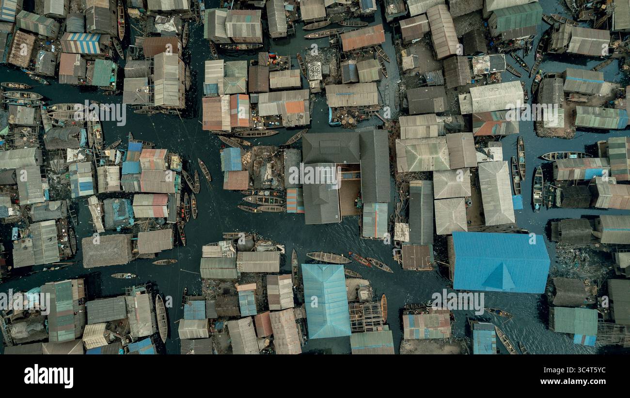 Aerial view of tightly packed buildings with colourful rooftops ...