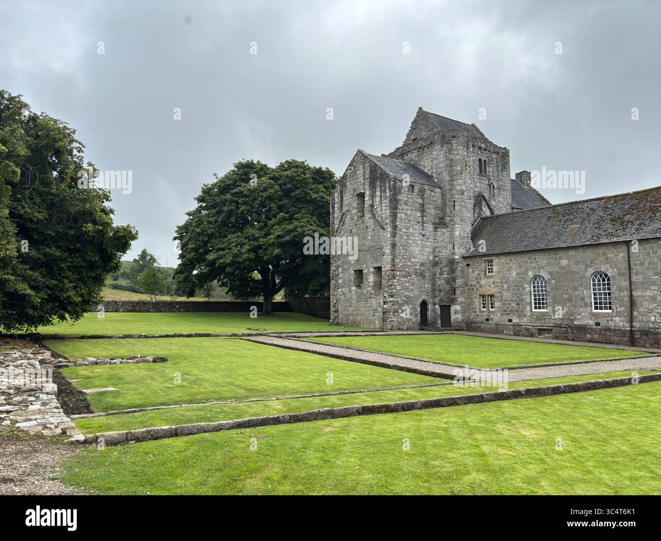 Ruined medieval Preceptory tower and transepts in Torphichen, showing ...