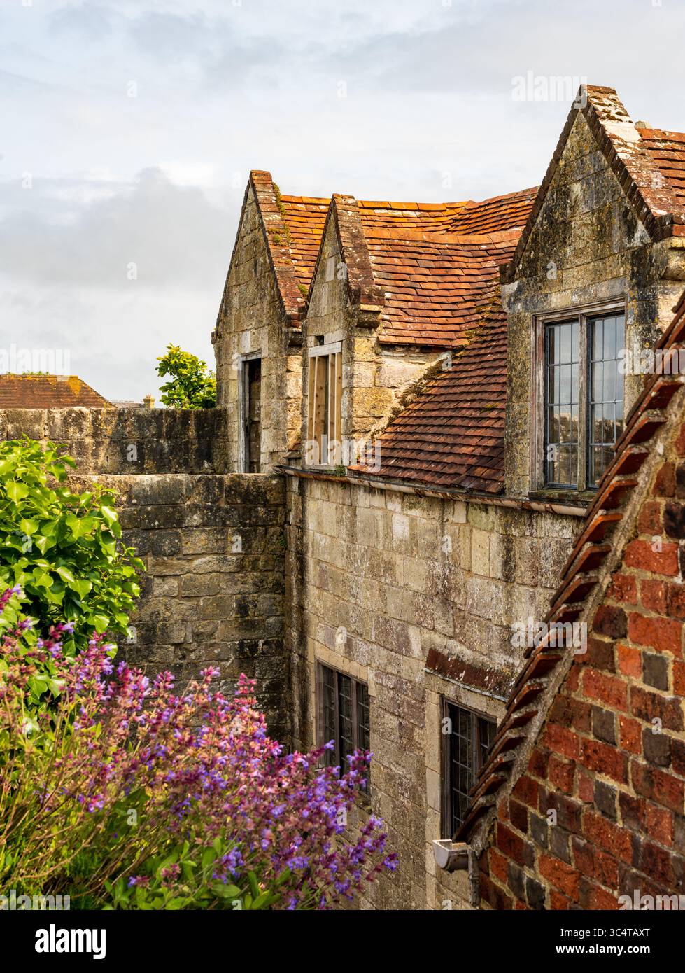 Yarmouth Castle architecture with red tiled roof and stone walls with ...