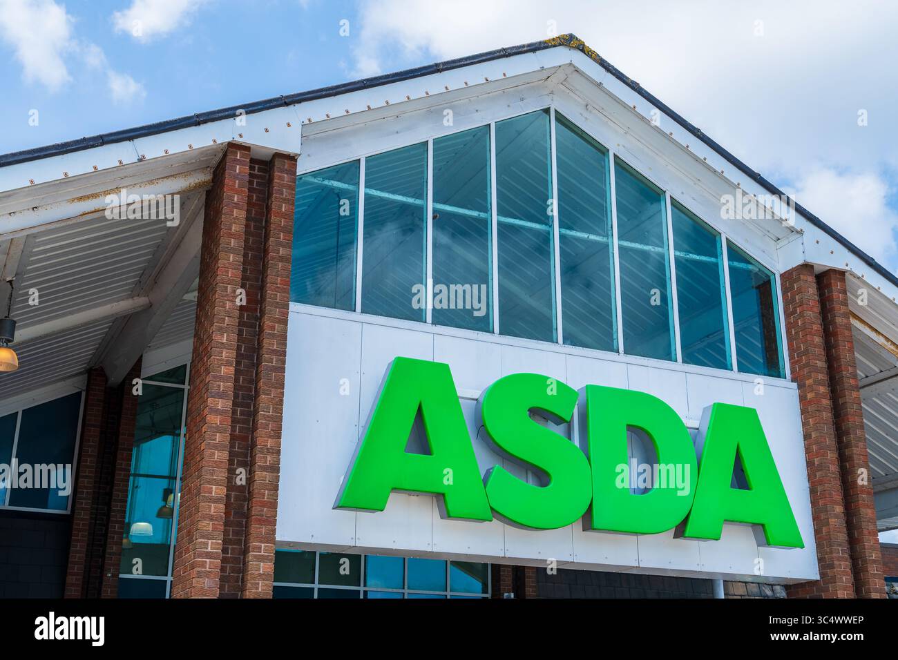Norwich, UK – July 25th 2025: External signage of an Asda supermarket ...