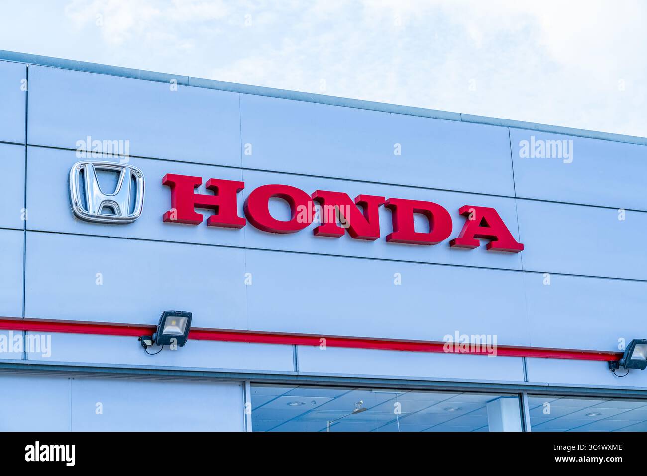 Norwich, UK – July 25th 2025: External signage on the side of a ...