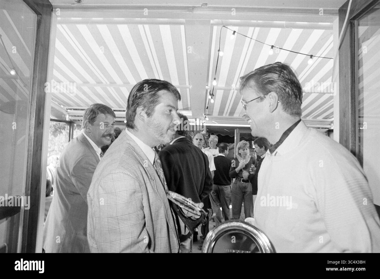 Two people engaged in friendly Black and White Stock Photos & Images ...