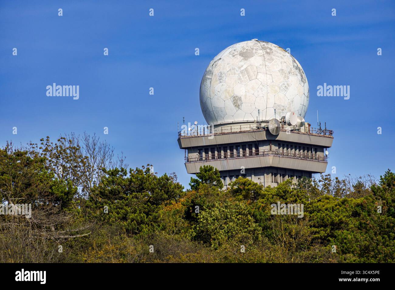 A radar dome from Austria’s air defense system stands atop a multi ...