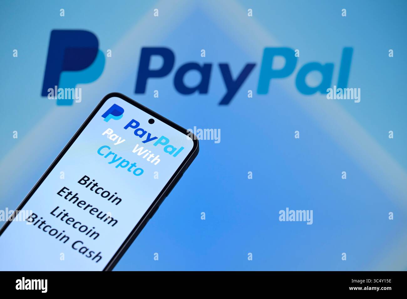 PayPal logo is being displayed on a smartphone with PayPal seen in the ...