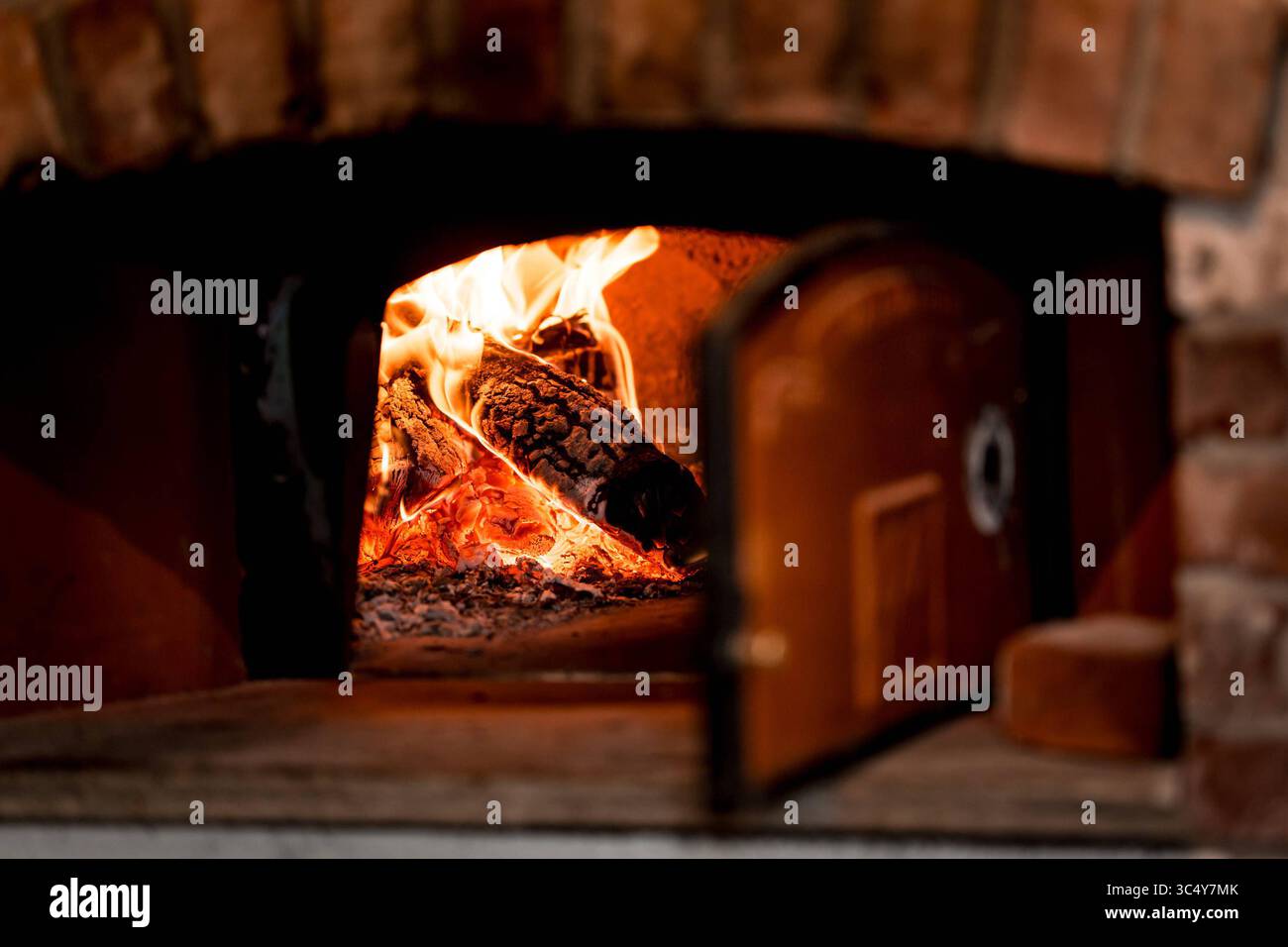 26.07.2025 A wood-fire oven in a Bakery at Borgund, Norway, 26.07.2025 ...