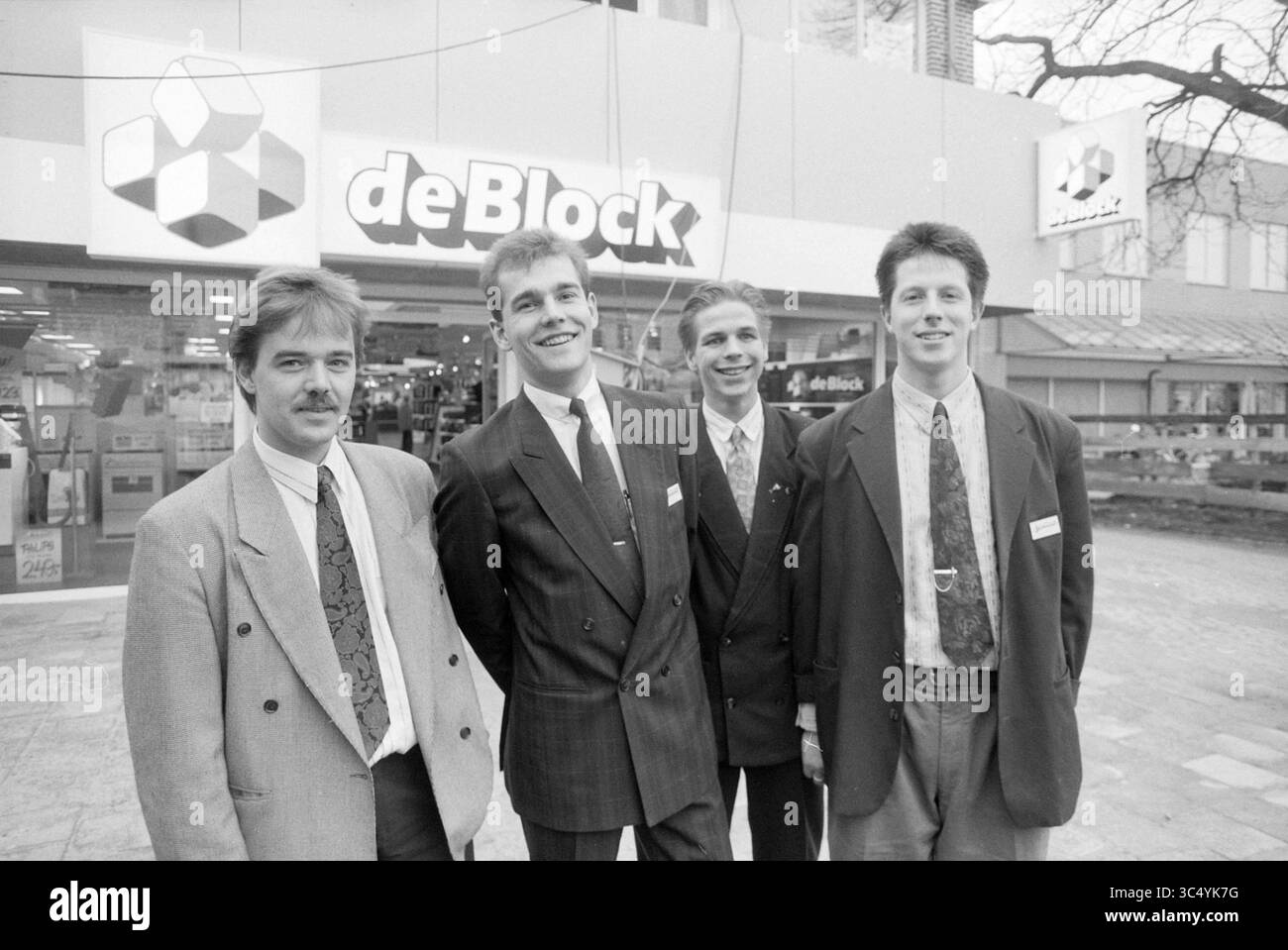 Smart suits poses confidently outside hi-res stock photography and ...