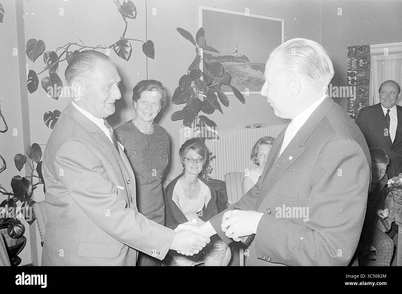 Group of people watch Black and White Stock Photos & Images - Alamy