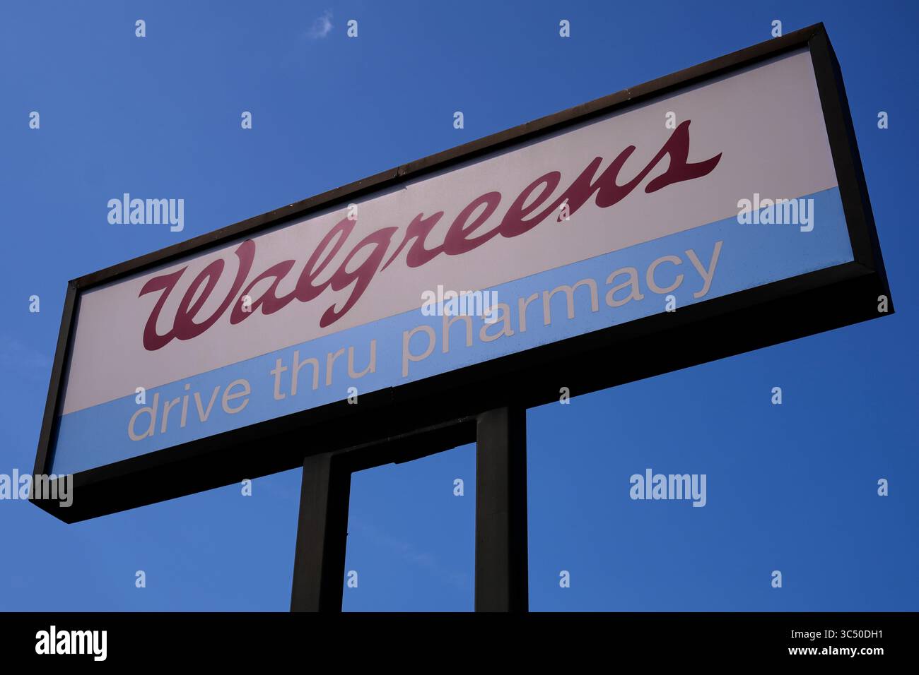 The Walgreens sign is displayed outside a retail store, Tuesday, July ...